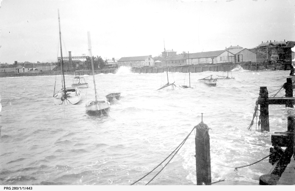 Rough seas pounding small craft and the shores of Wallaroo boat harbour ...